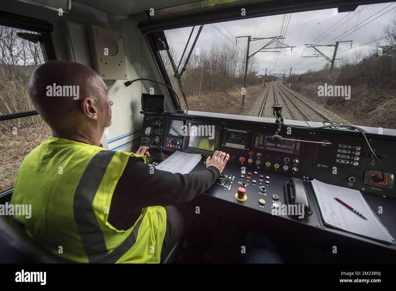 Illustration shows a driver in a train at the launching by Infrabel ...