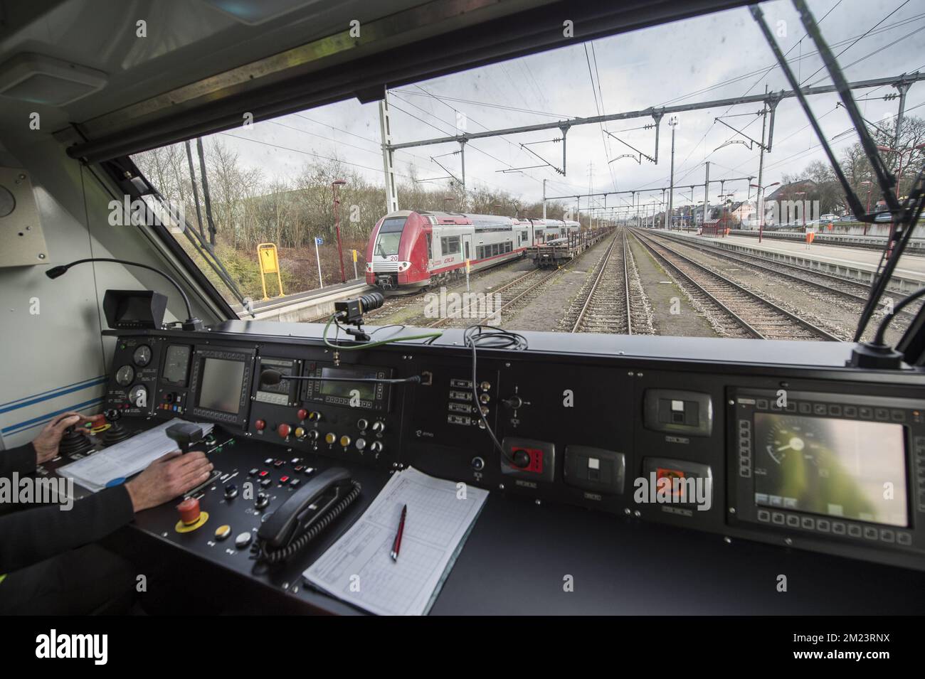 Illustration shows the driver in a train at the launching by Infrabel ...