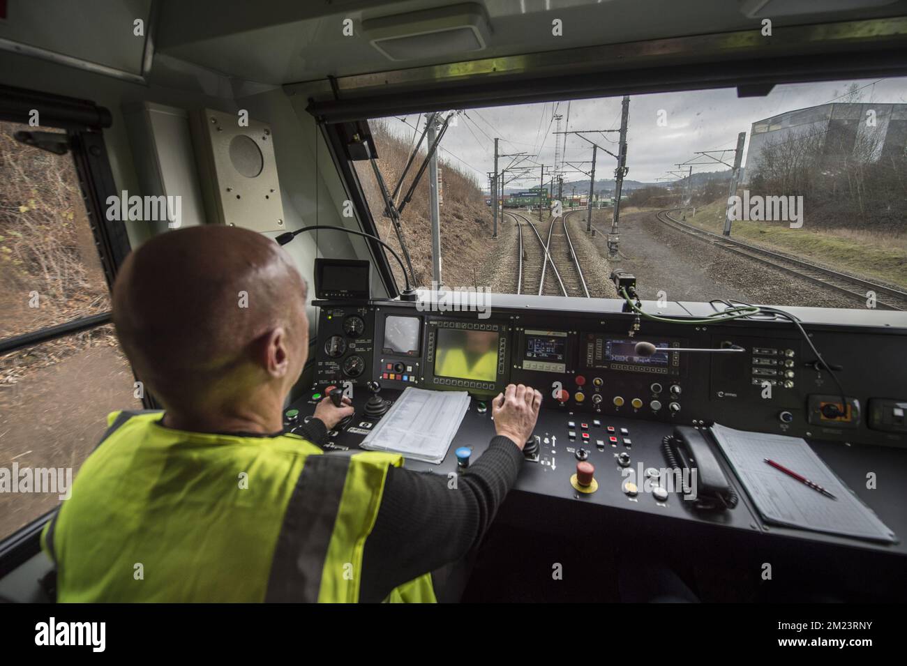 Illustration shows a driver in a train at the launching by Infrabel ...