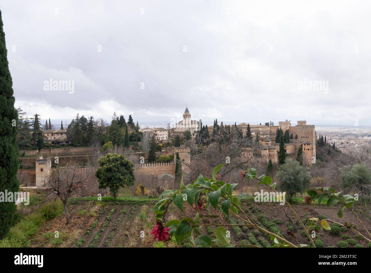 Generalife gardens palace landscape with antique walls in cloudy day ...