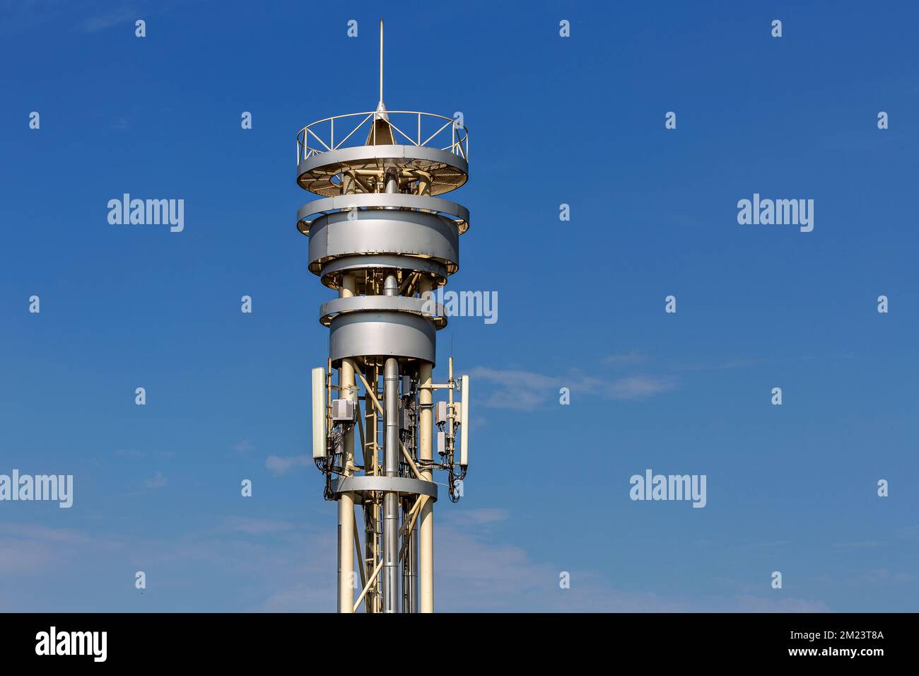 Cell tower against the blue sky Stock Photo - Alamy