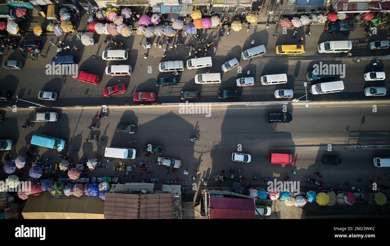 An aerial shot of colorful buses at lorry station in Ghana Stock Photo ...