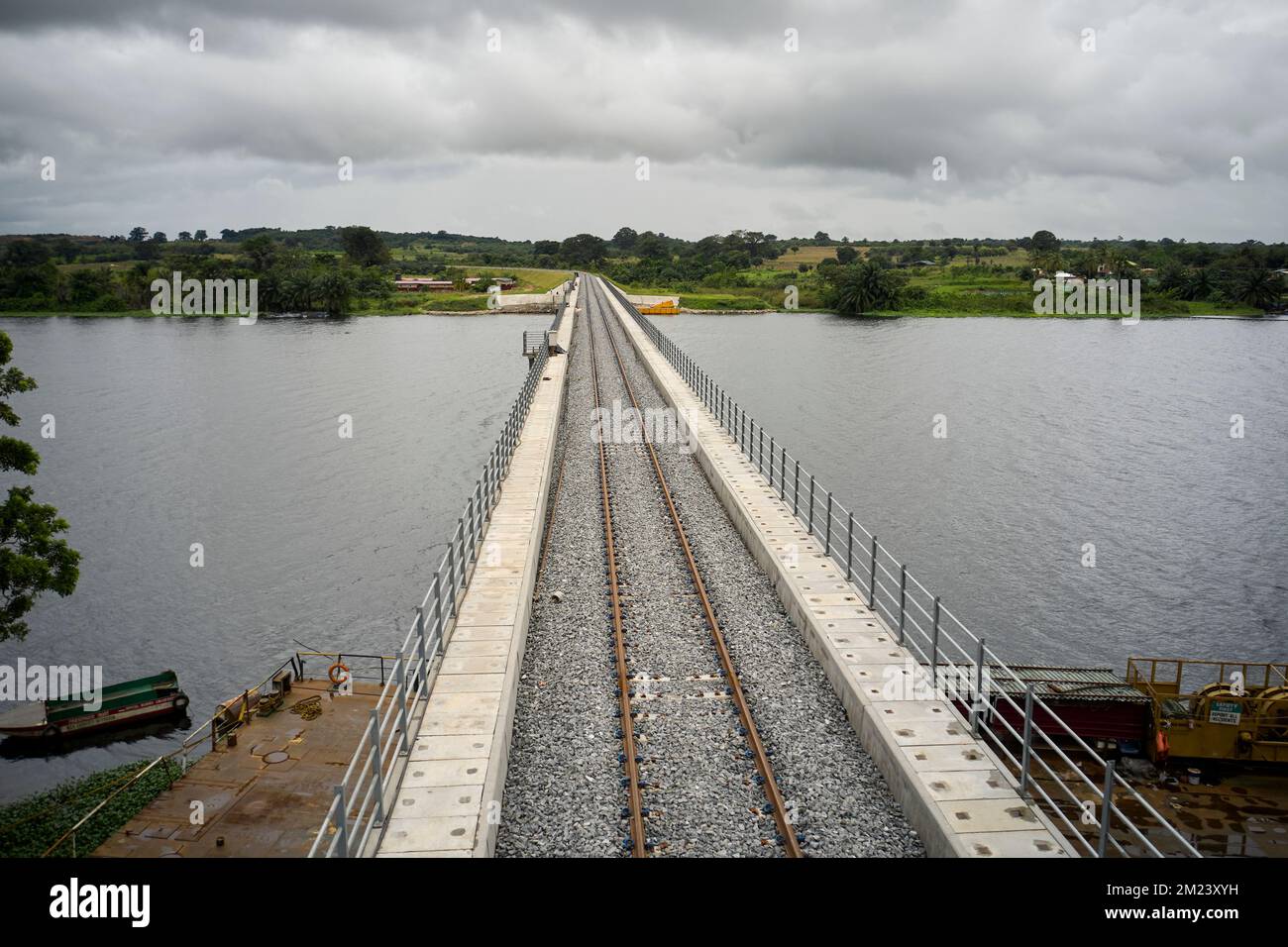A bird's eye view of a train track over a river in Ghana Stock Photo ...