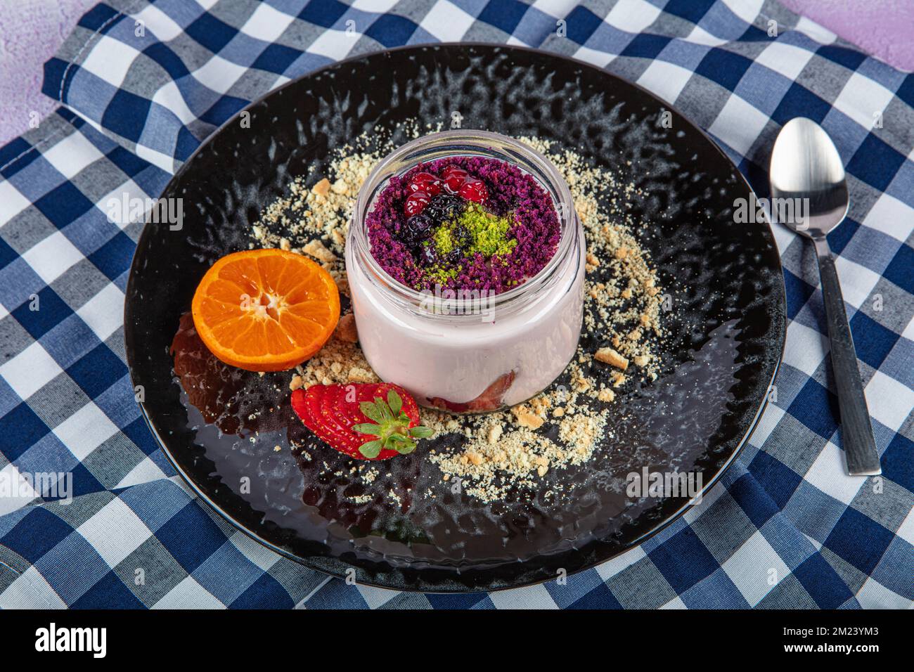 Strawberry magnolia Dessert with cream and strawberry filling on a ...