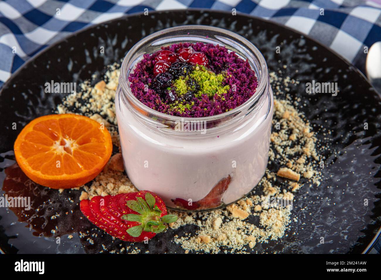 Strawberry magnolia Dessert with cream and strawberry filling on a ...