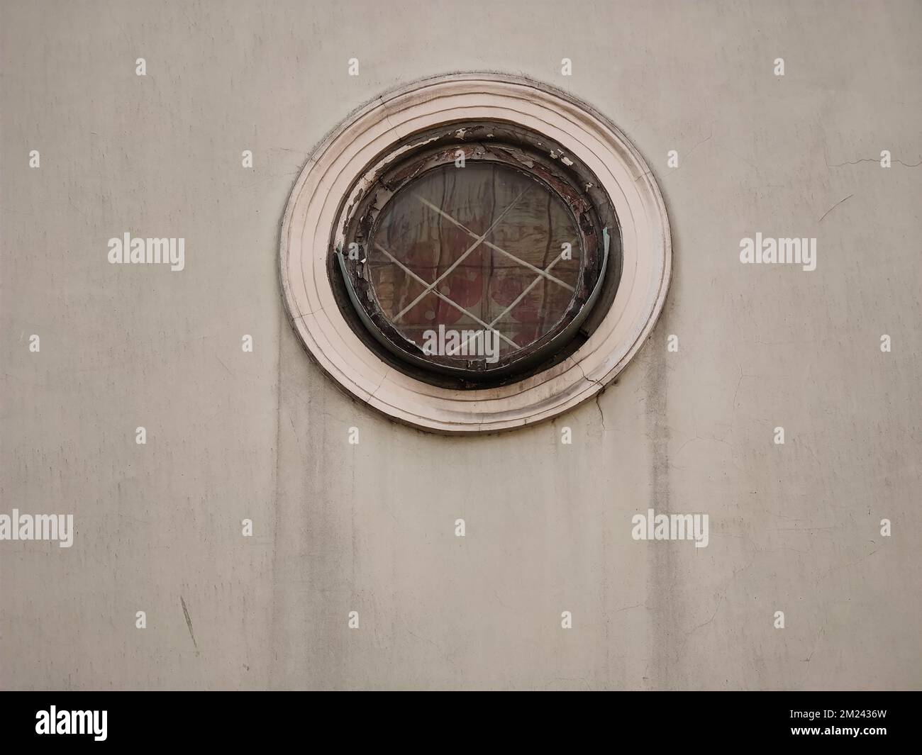 Small round window on white wall. Close-up Stock Photo - Alamy