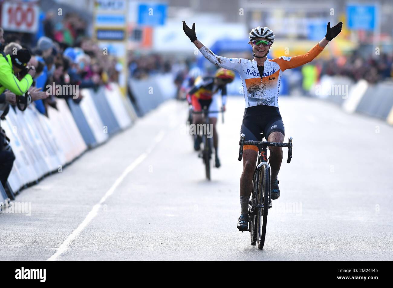 Dutch Marianne Vos celebrates as she crosses the finish line at the ...