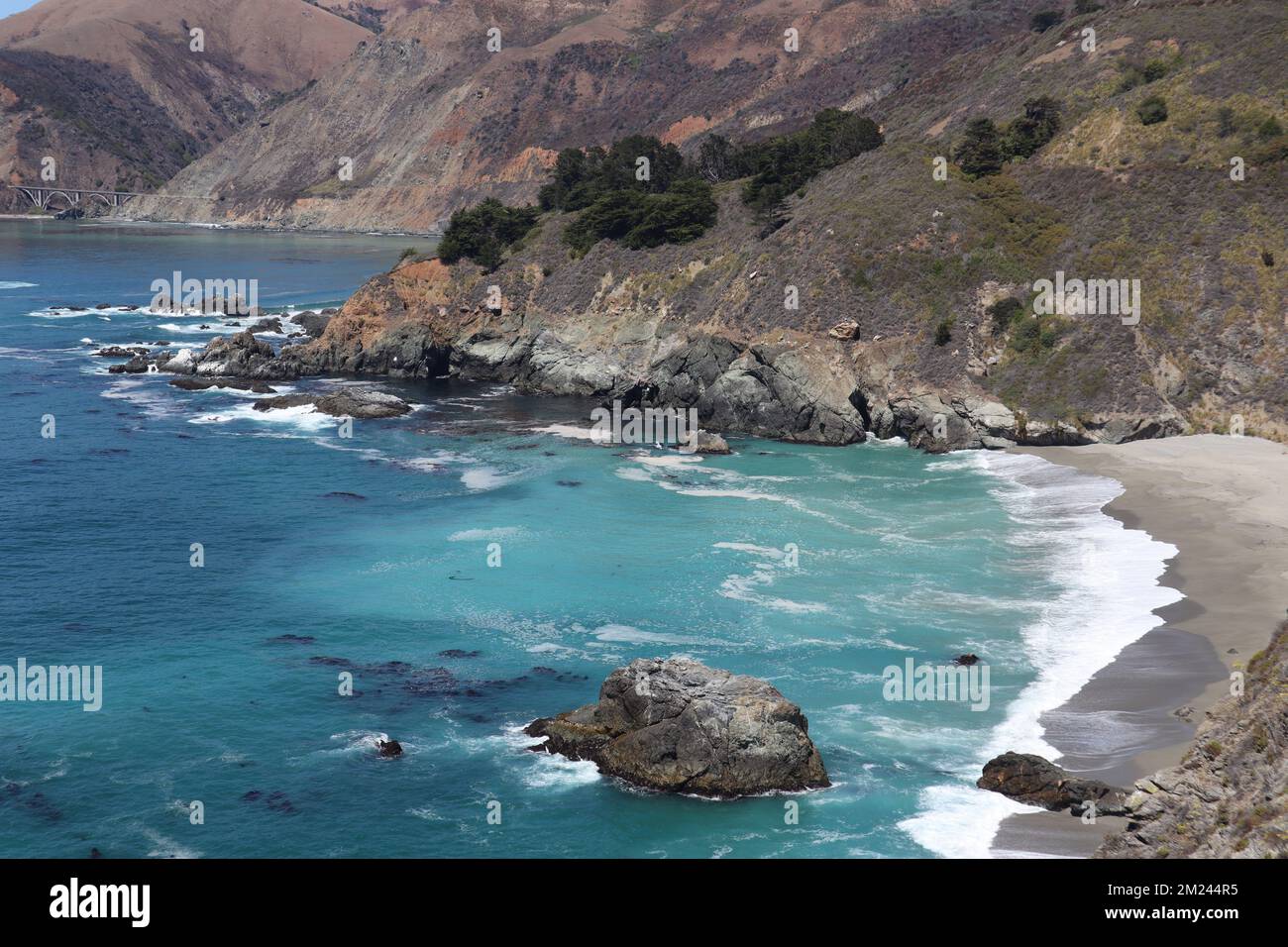 An aerial view of the rocky coastline along the Pacific Ocean on the ...
