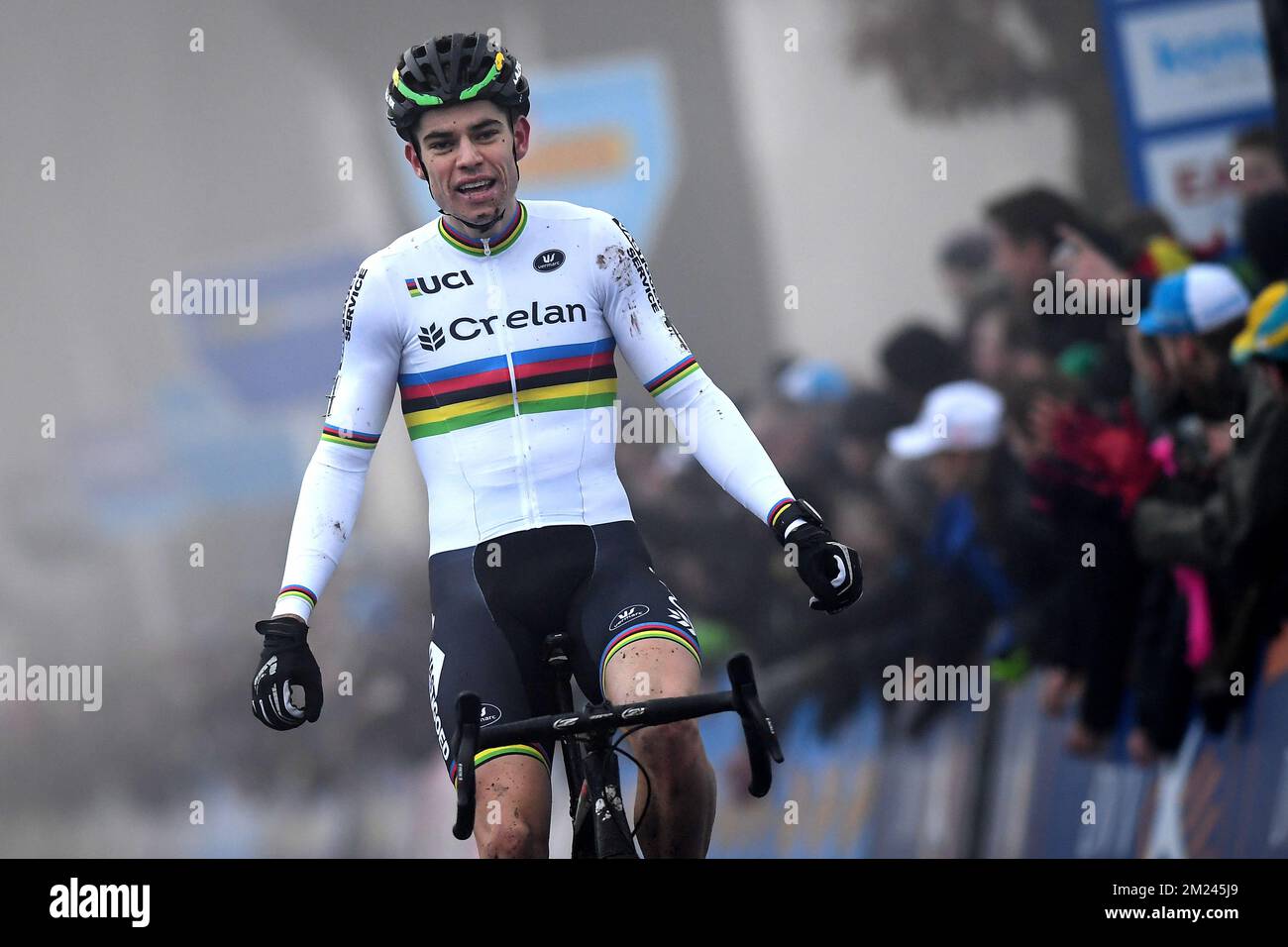 Belgian world champion Wout Van Aert celebrates as he crosses the ...