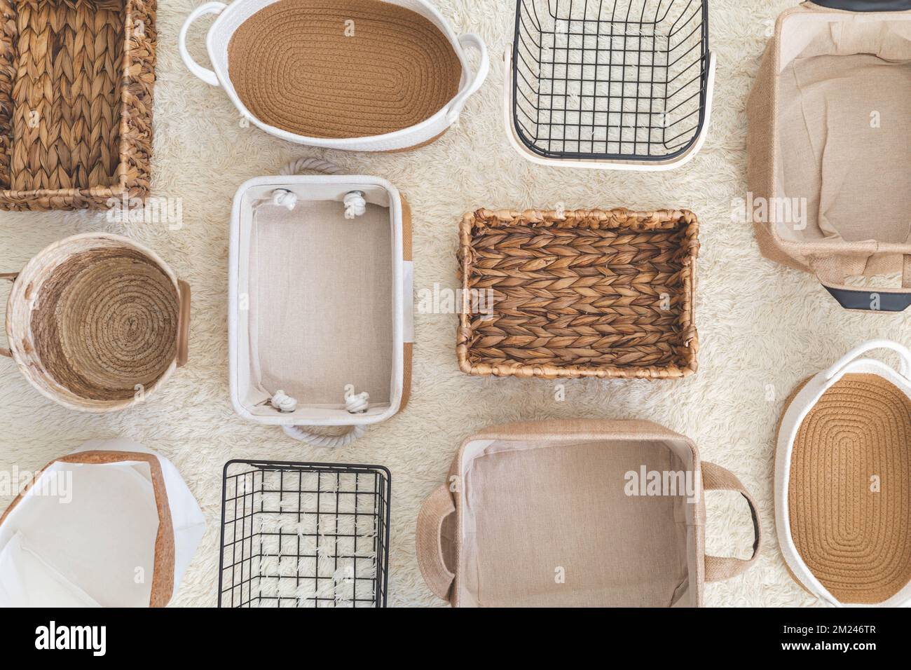 Flat lay of storage boxes; containers and baskets with different sizes ...