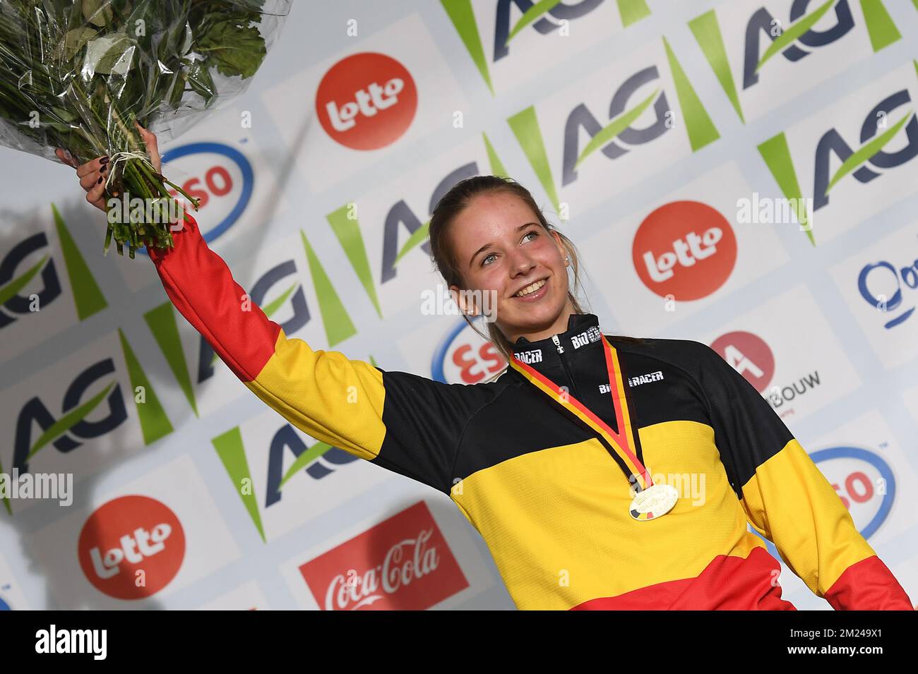 Belgian Tess Van Loy celebrates on the podium after the women's race at ...