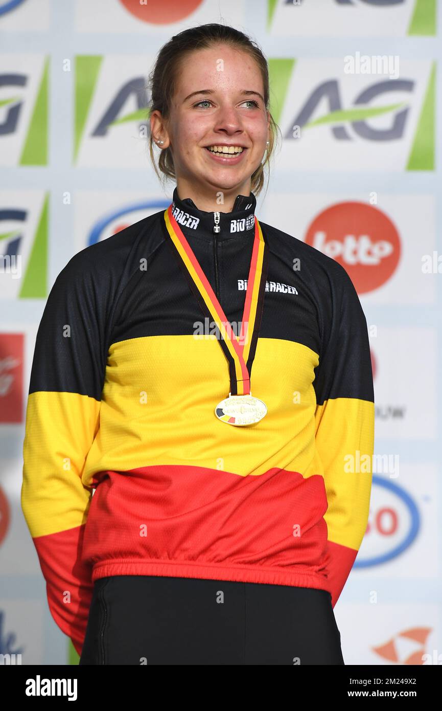 Belgian Tess Van Loy celebrates on the podium after the women's race at ...