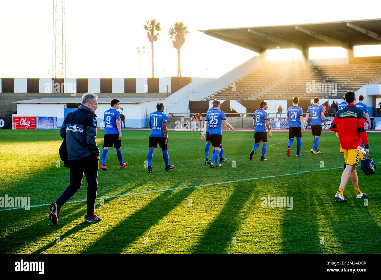 Club's players pictured at the start of a friendly soccer game between ...