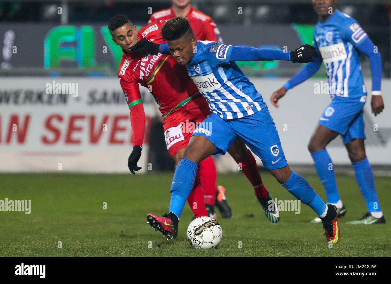 Oostende's Yassine El Ghanassy and Genk's Leon Bailey fight for the ...