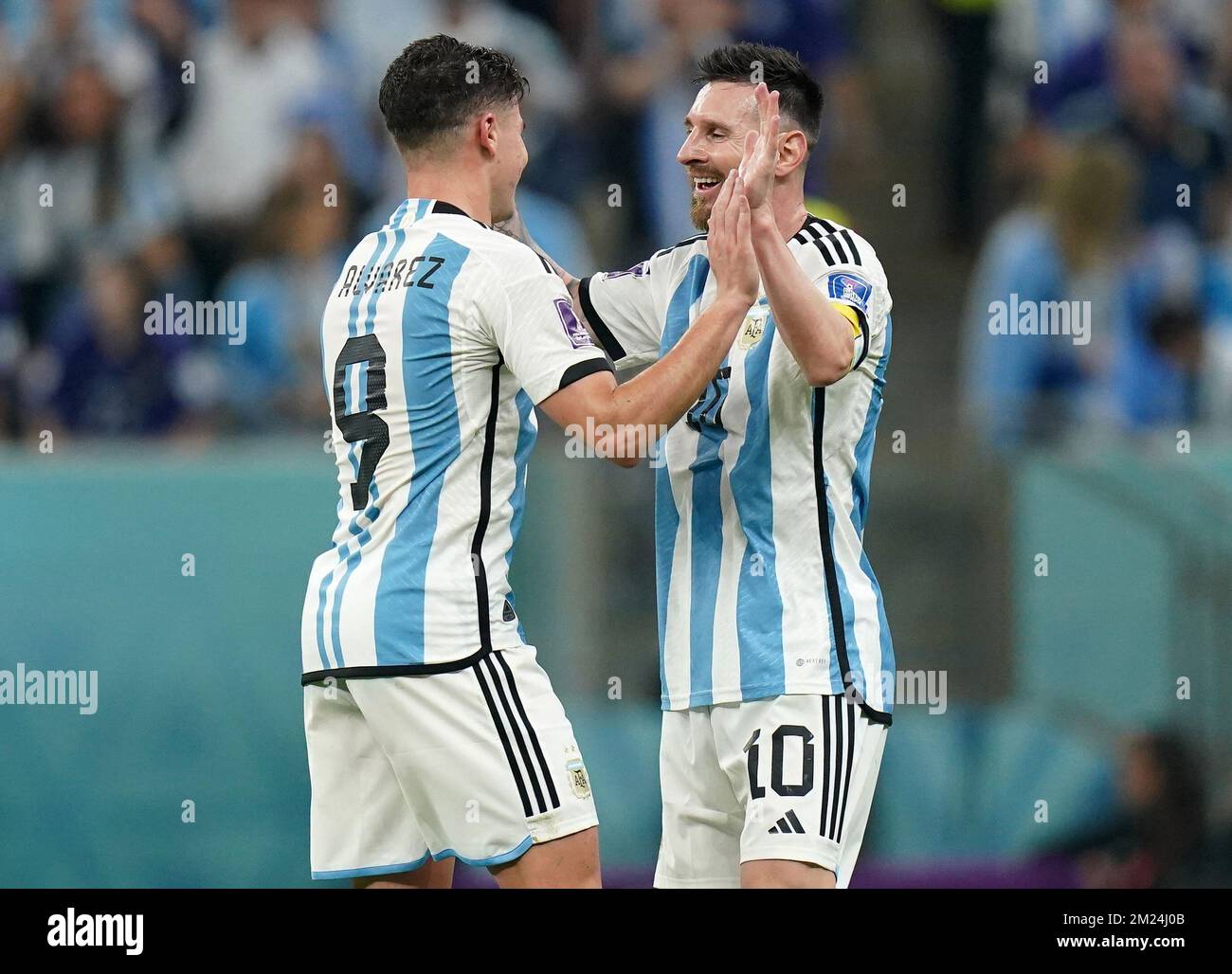 Argentina's Julian Alvarez celebrates scoring their side's third goal ...