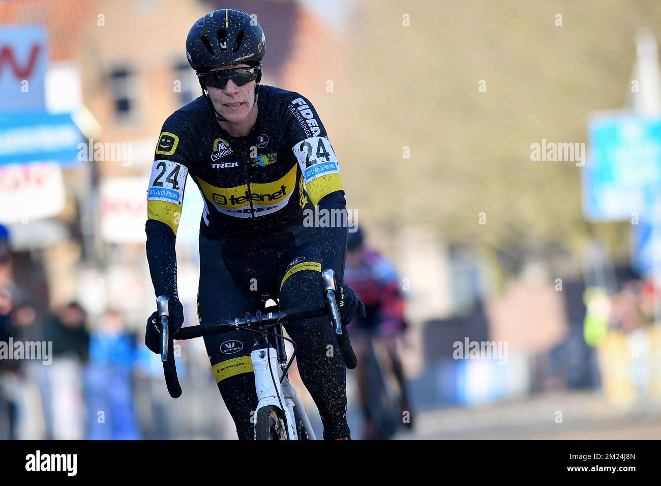 Belgian Ellen Van Loy crosses the finish line at the women's race of ...