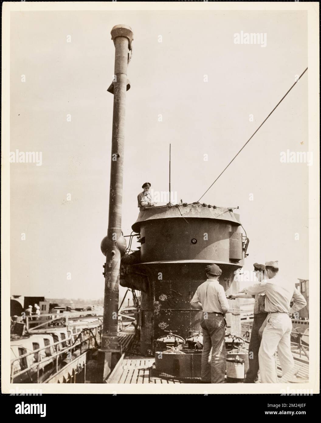 Captured German sub is shown with 'Schnorkle' pipe fully elevated ...