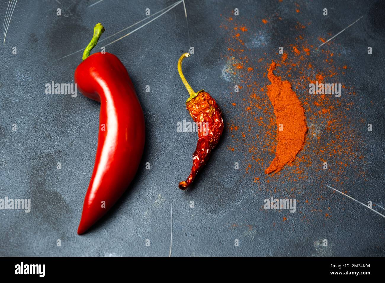 Red pepper in various stages. Raw red pepper, dried and red chili ...