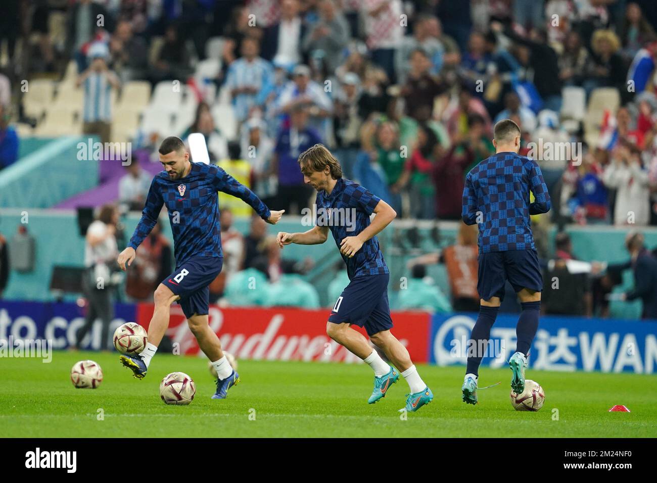 DOHA, QATAR - DECEMBER 13: (L-R) Player of Croatia Mateo Kovacic, Luka ...