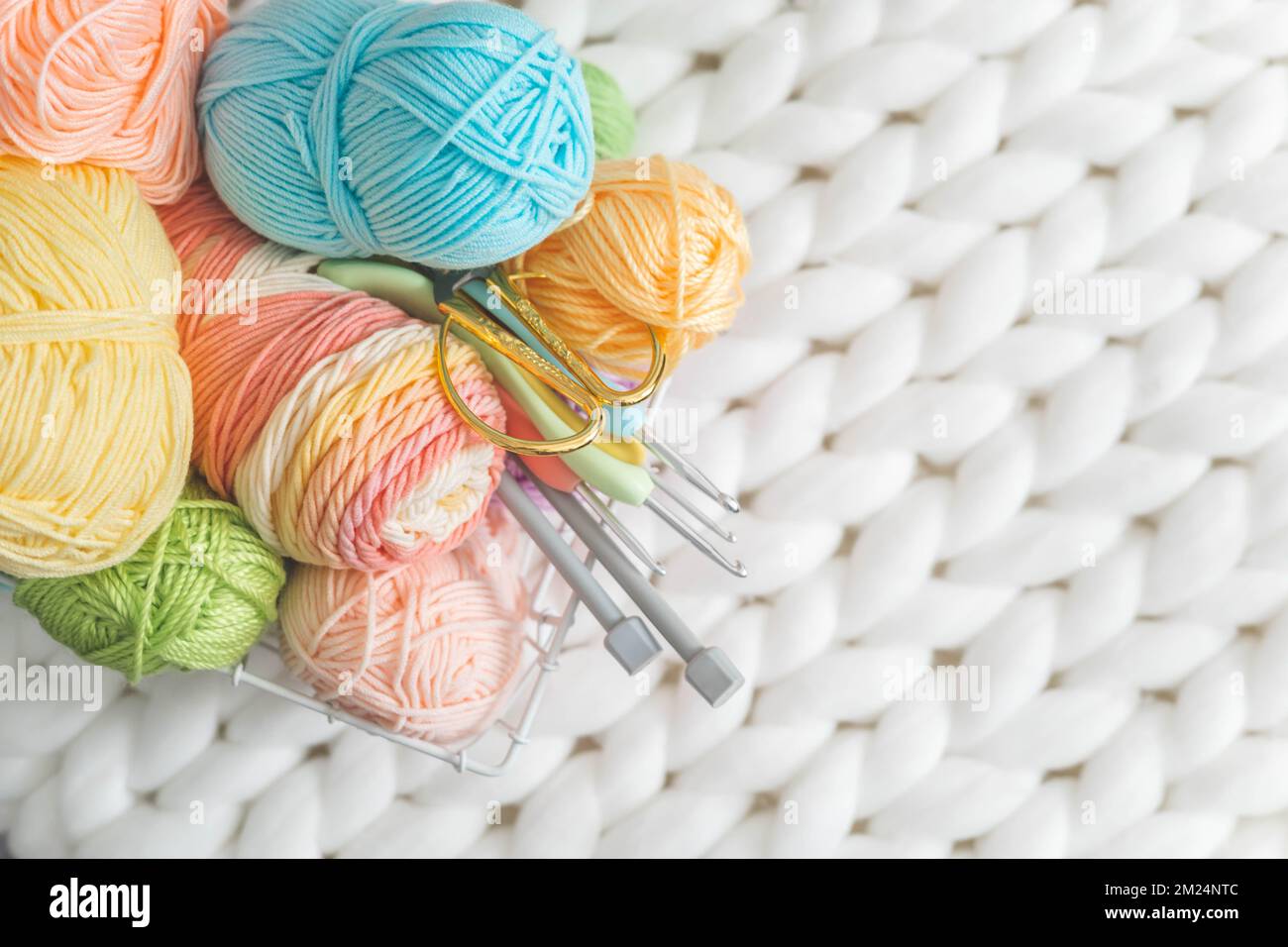 Cozy homely atmosphere. Female hobby knitting. Yarn pastel multicolor ...