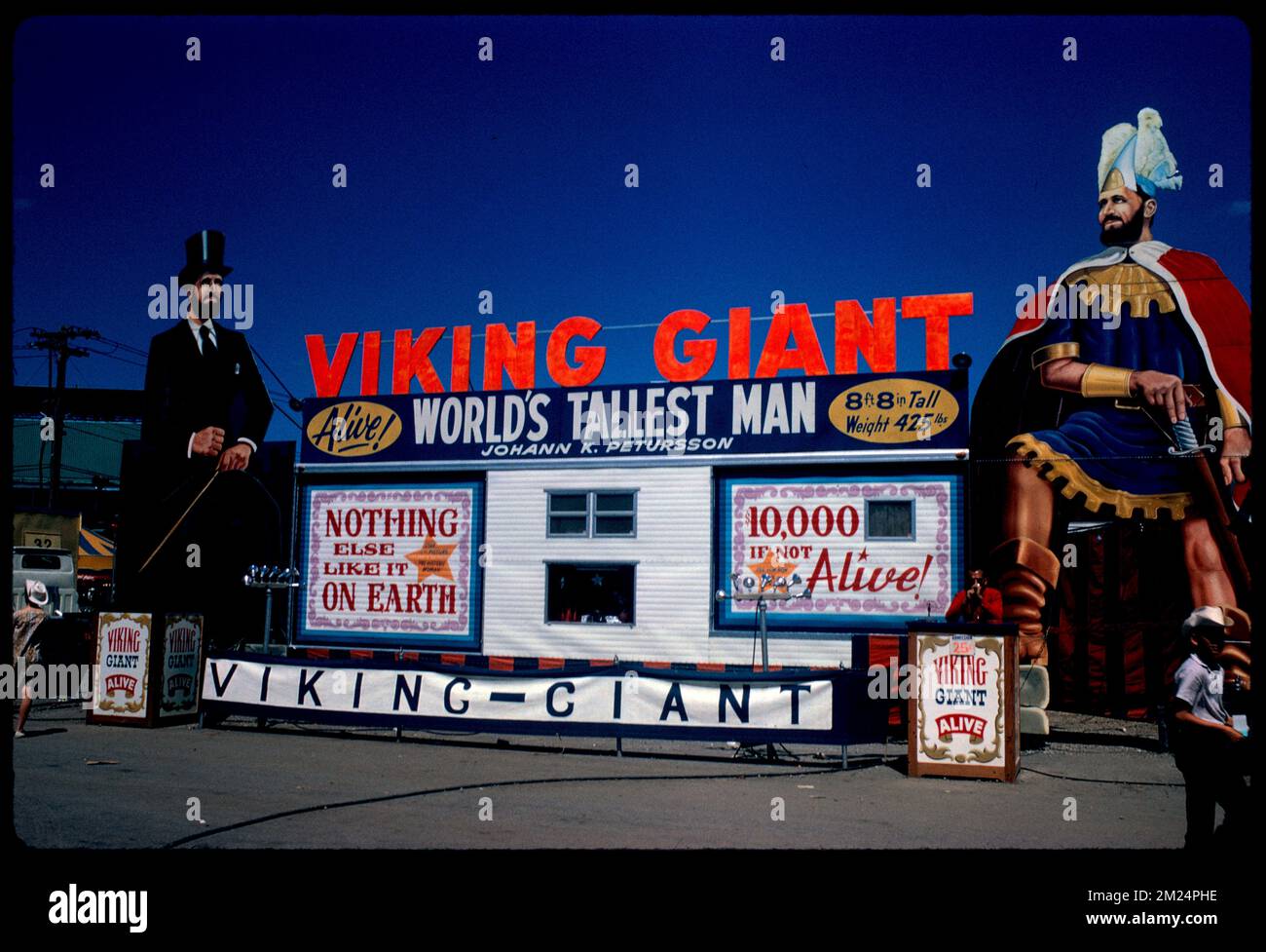 Carnival attraction advertising Viking Giant Johann K. Petursson at ...