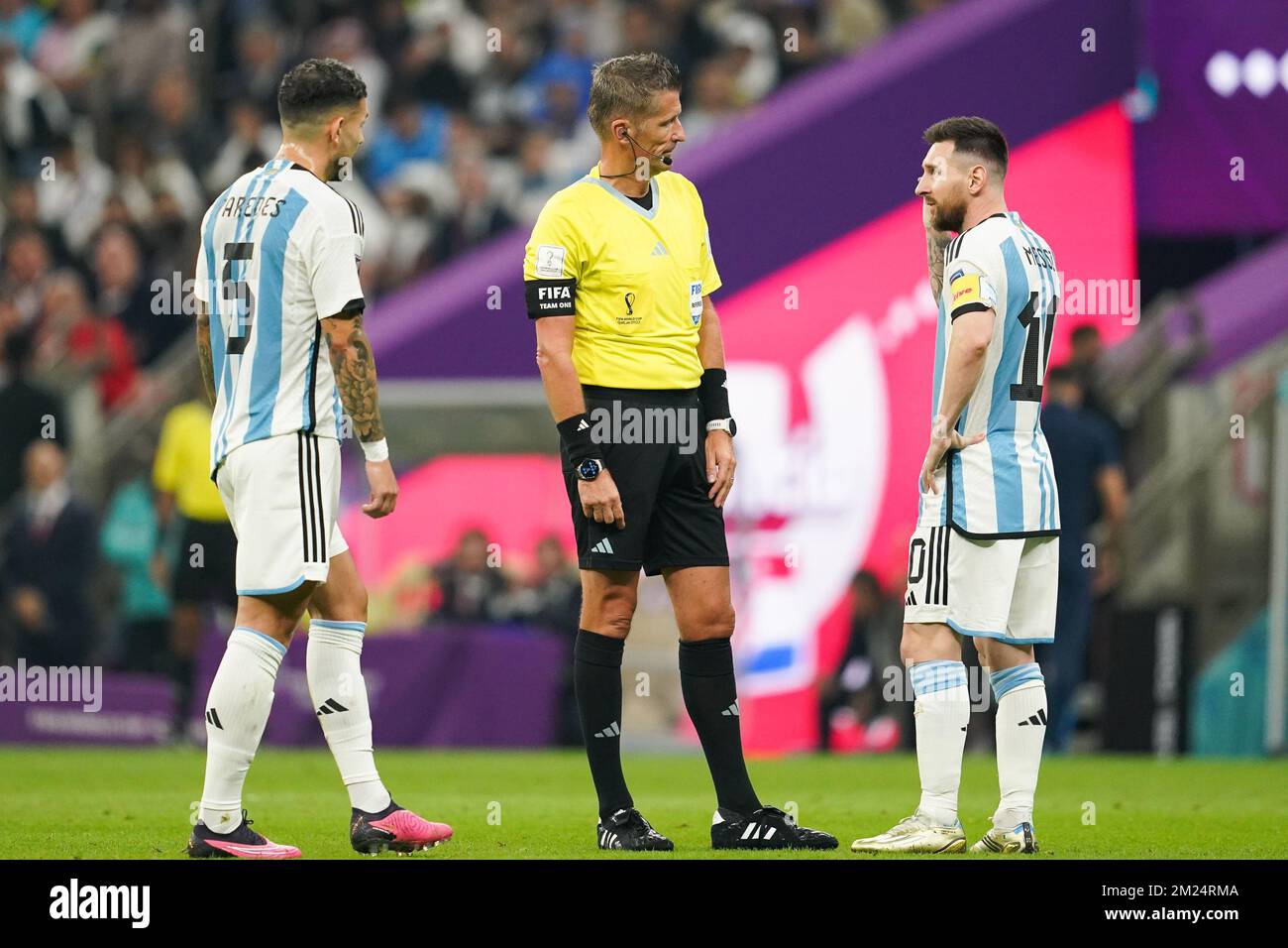 DOHA, QATAR - DECEMBER 13: Player of Argentina Lionel Messi and Leandro ...