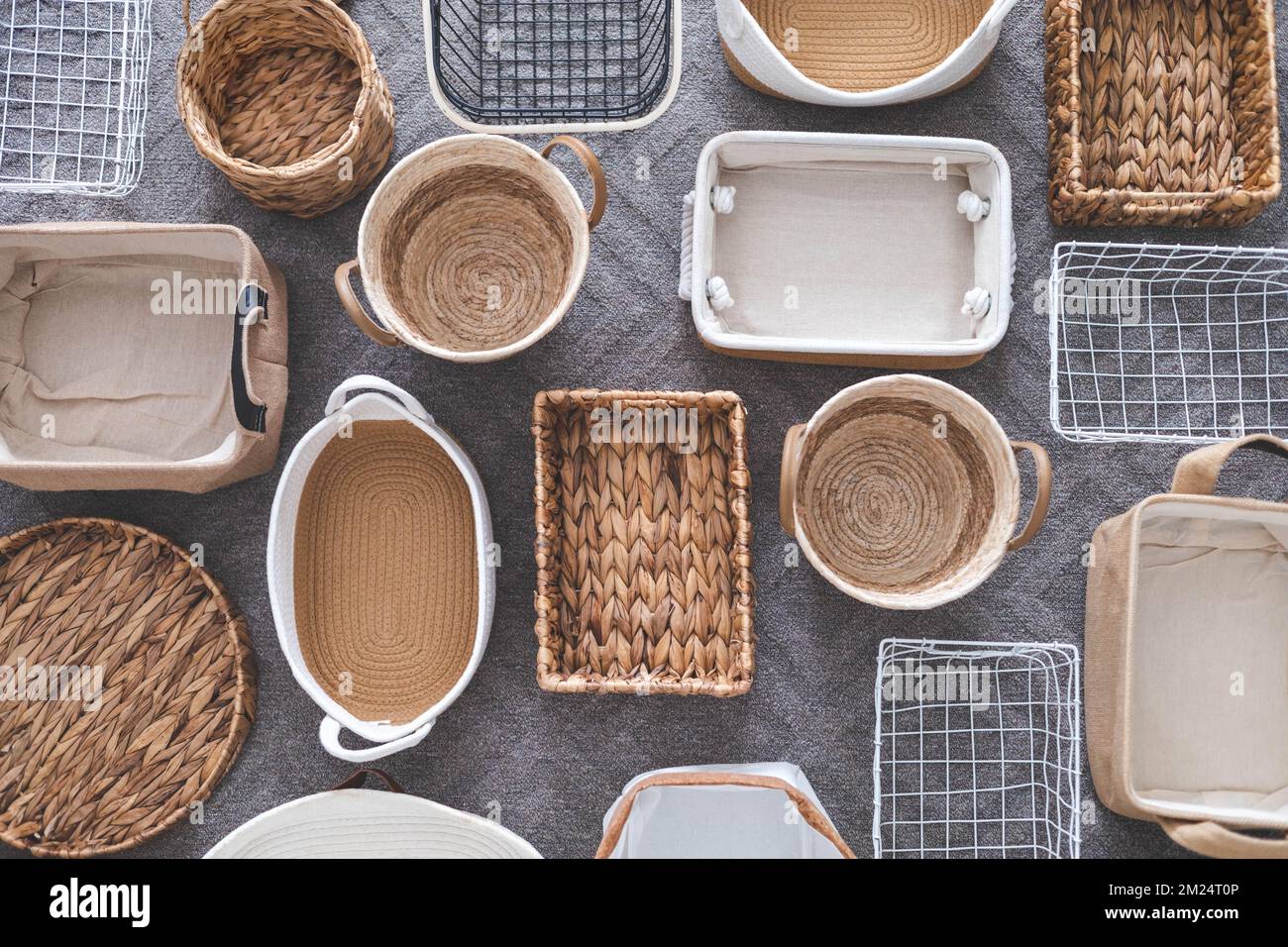Flat lay of storage boxes; containers and baskets with different sizes ...