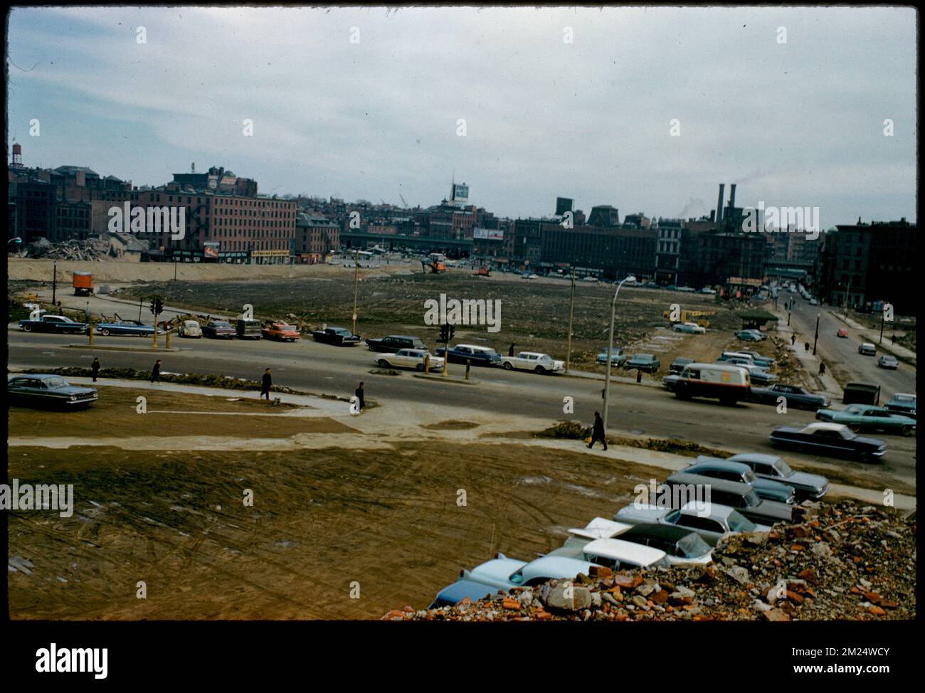 Cars parked around vacant lot, future site of City Hall Plaza , Vacant ...