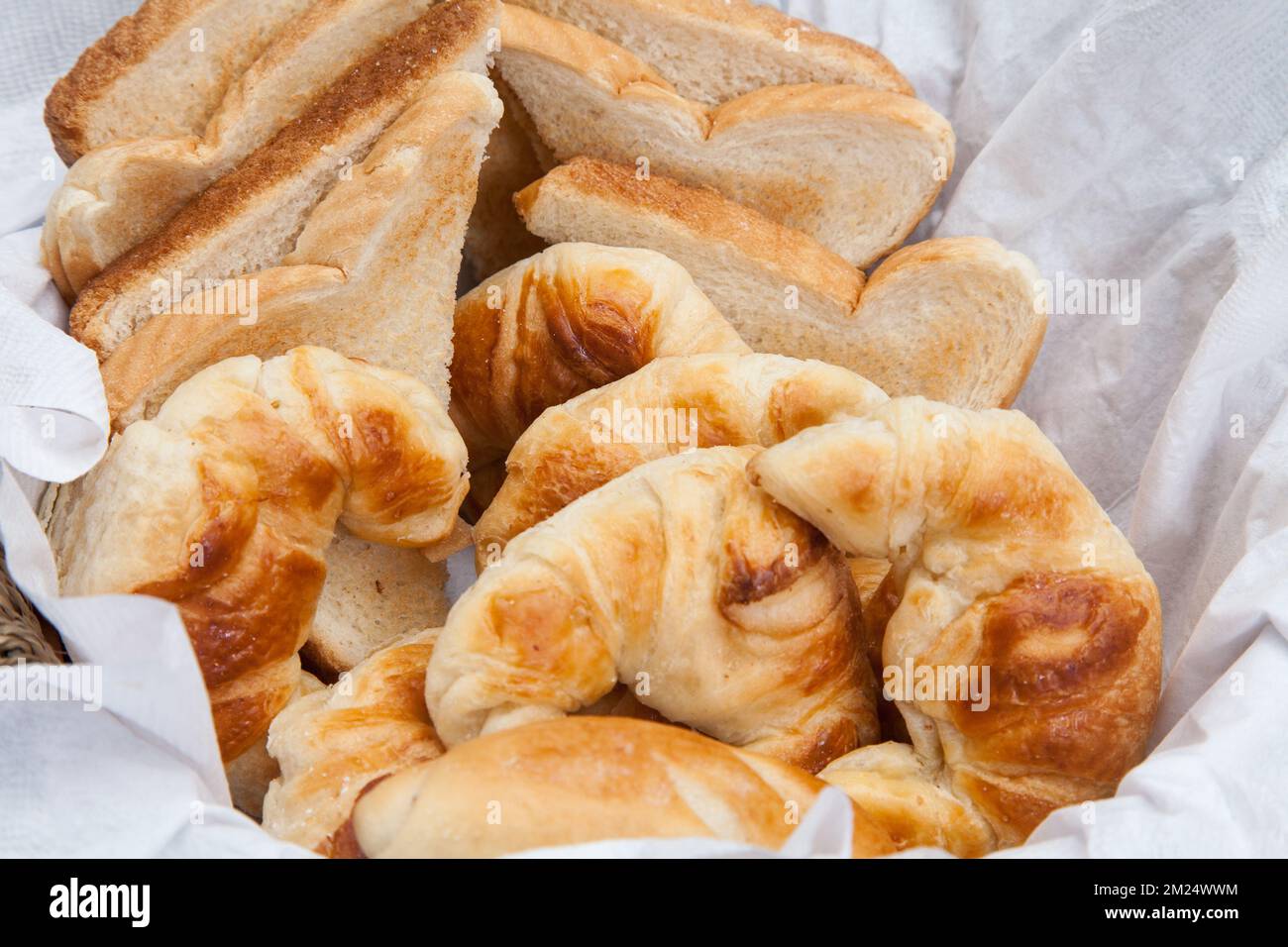 Basket With Different Types Of Breads For Breakfast Stock Photo - Alamy