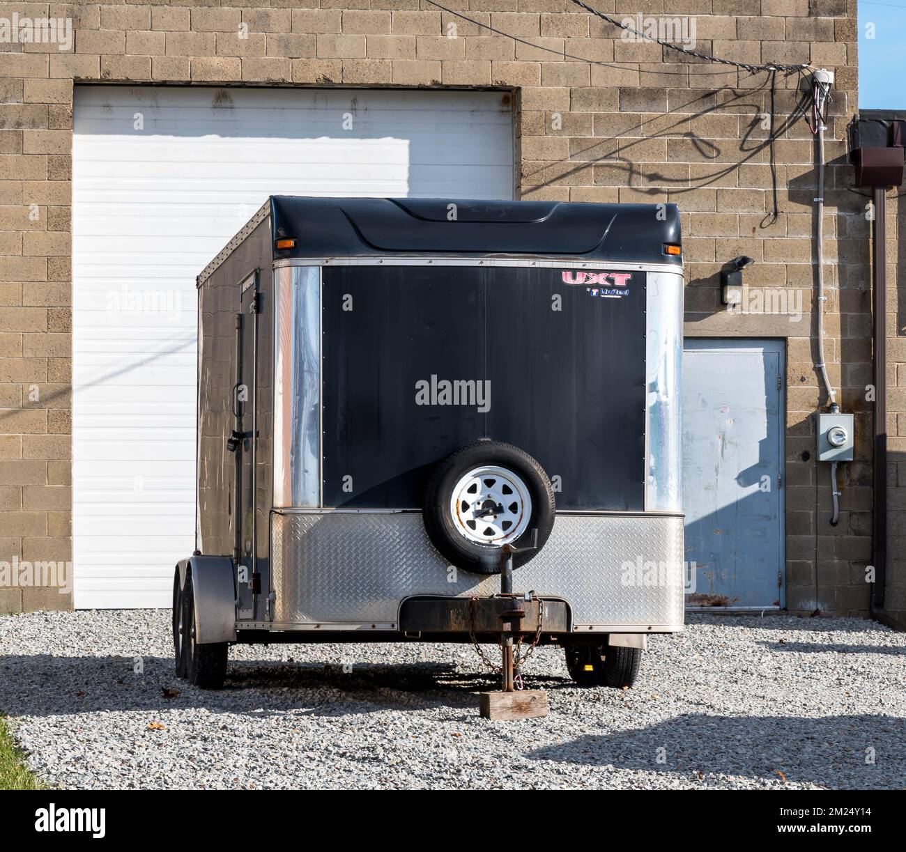 A parked trailer in front of a garage in Harmar Township, Pennsylvania ...