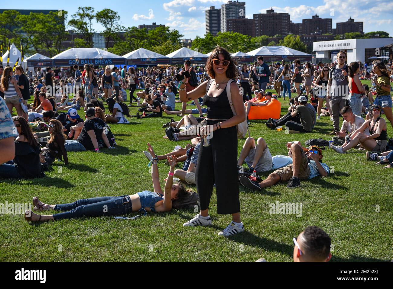 Crowd Fashion and Festival life at Governors Ball in New York Stock ...