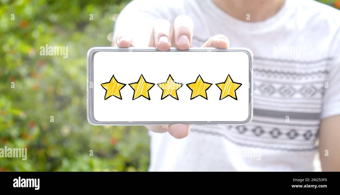 Five star cartoon sketch style on screen smartphone with blurred ...