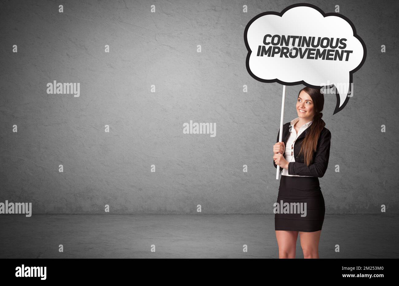 business person in casual holding road sign Stock Photo - Alamy