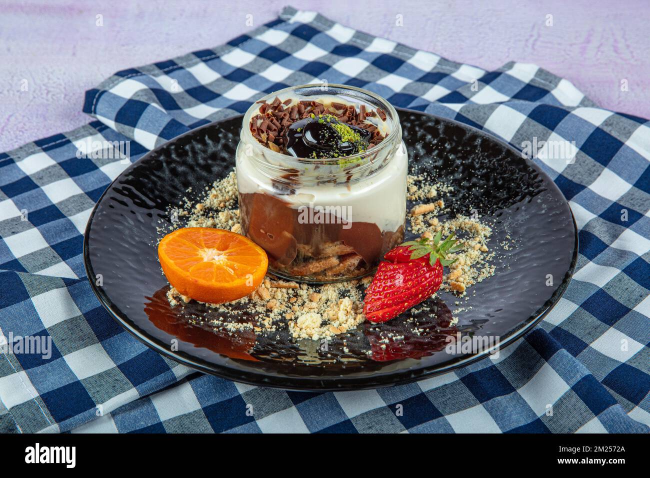 Stewed magnolia dessert. Chocolate magnolia dessert in glass cup on ...