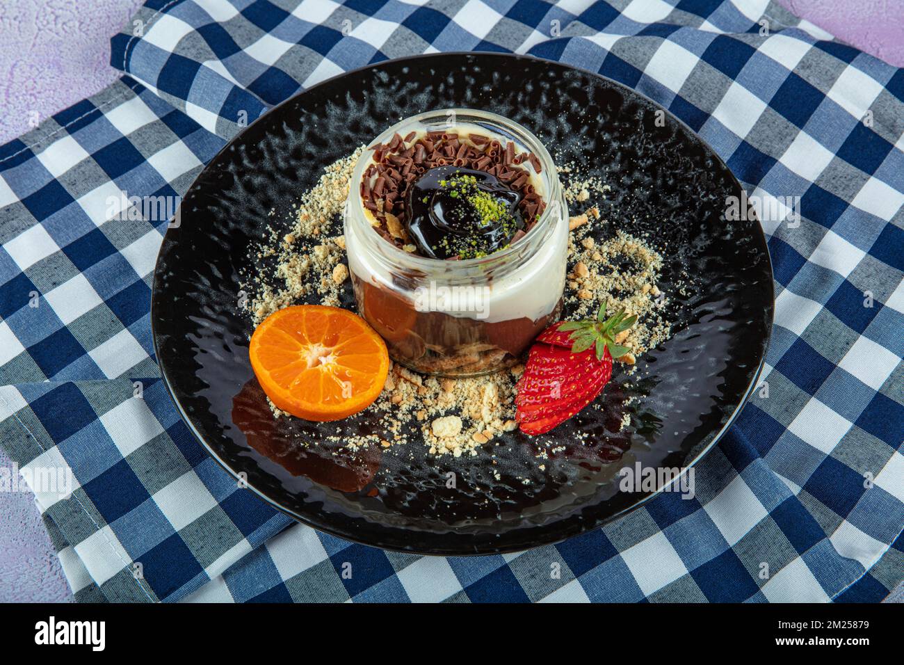 Stewed magnolia dessert. Chocolate magnolia dessert in glass cup on ...