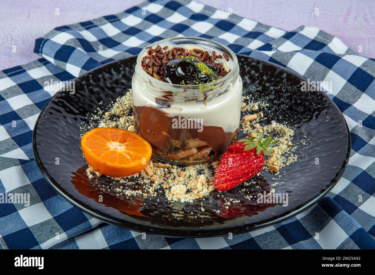 Stewed magnolia dessert. Chocolate magnolia dessert in glass cup on ...
