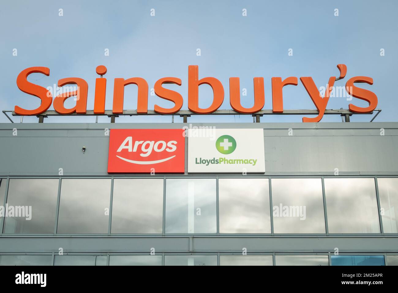 Basingstoke, UK- September 2022: Sainsbury’s entrance with Argos and ...