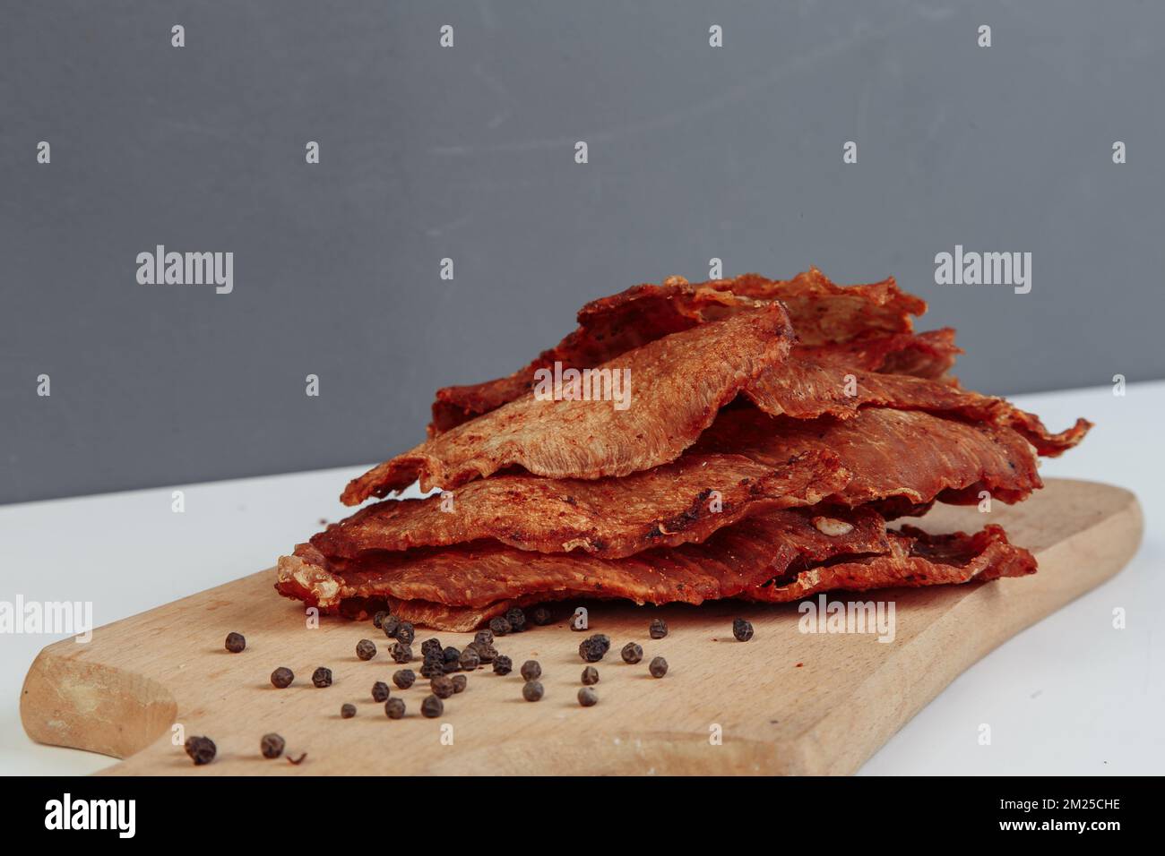 Some craft cardboard boxes with dehydrated dog treats, the highest one ...