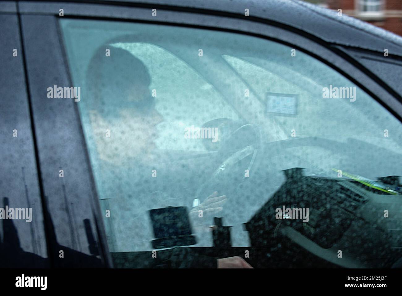 Leopold Storme pictured as he is leaving prison in a taxi, on Tuesday ...