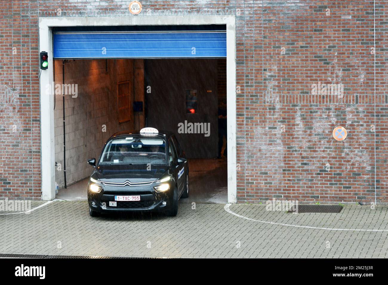 Leopold Storme pictured as he is leaving prison in a taxi, on Tuesday ...