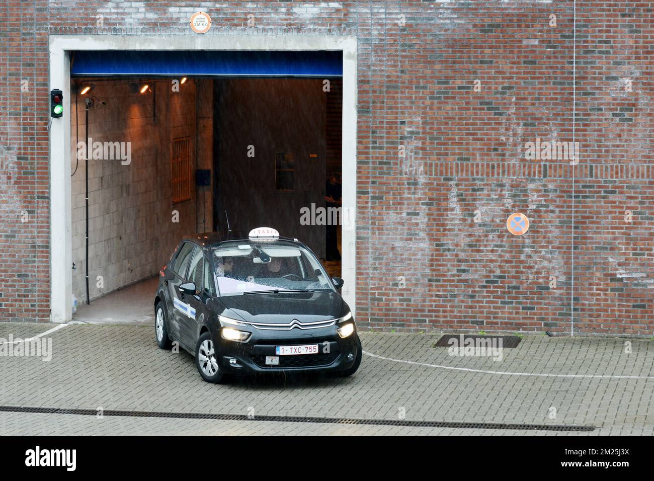 Leopold Storme pictured as he is leaving prison in a taxi, on Tuesday ...
