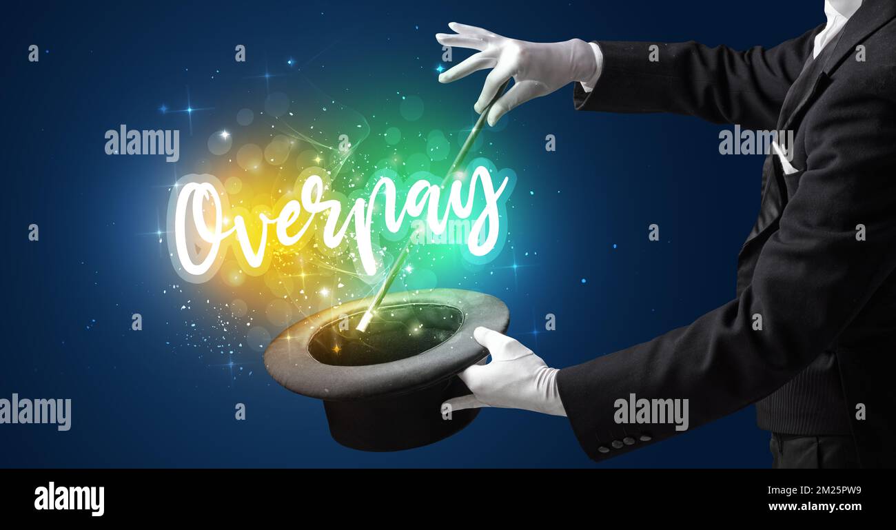 Young magician is showing magic trick Stock Photo - Alamy