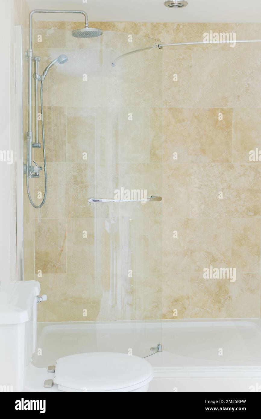 Minimalist, clean and brightly lit three piece bathroom with shower ...