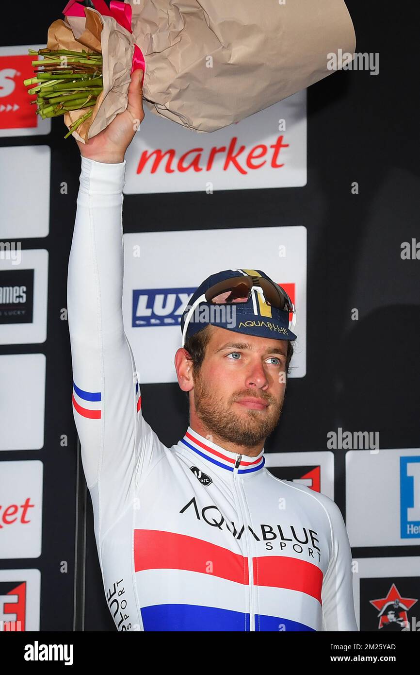 British Adam Blythe of Aqua Blue Sport celebrates on the podium after ...