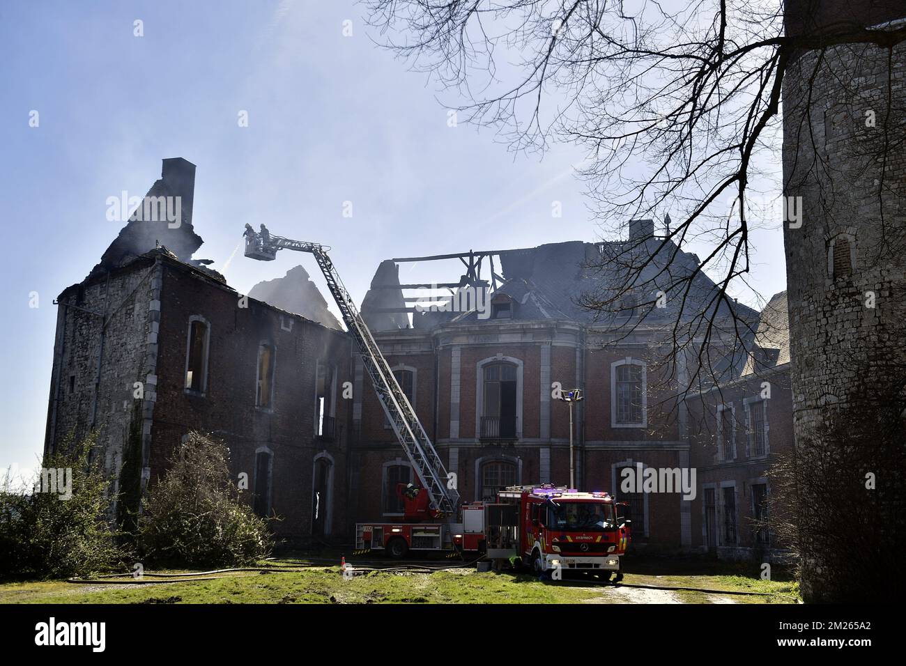 Firefighters pictured in action on the scene of a fire in the 'Chateau ...