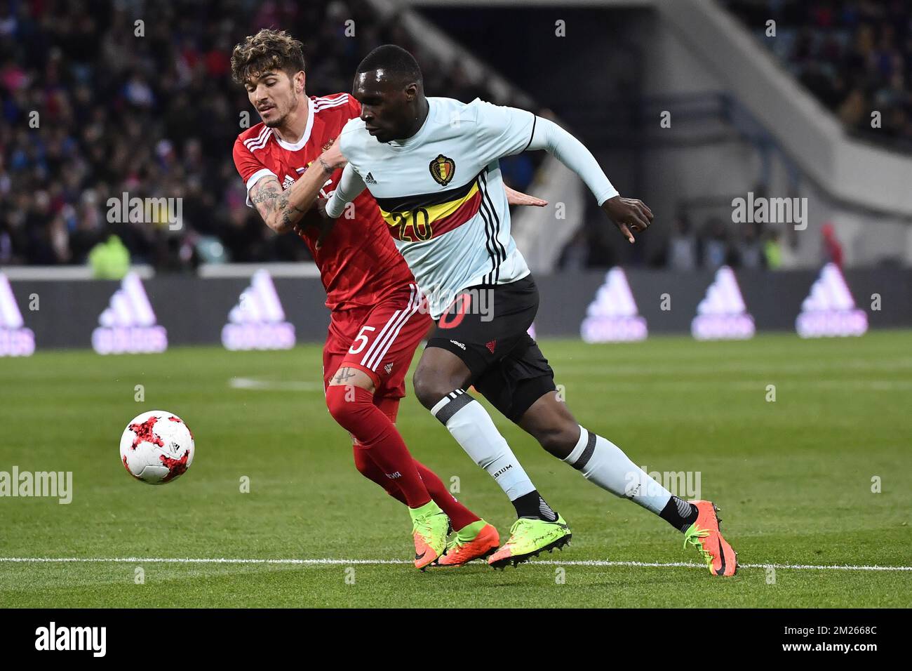 Russia's Viktor Vasin and Belgium's Christian Benteke pictured in ...