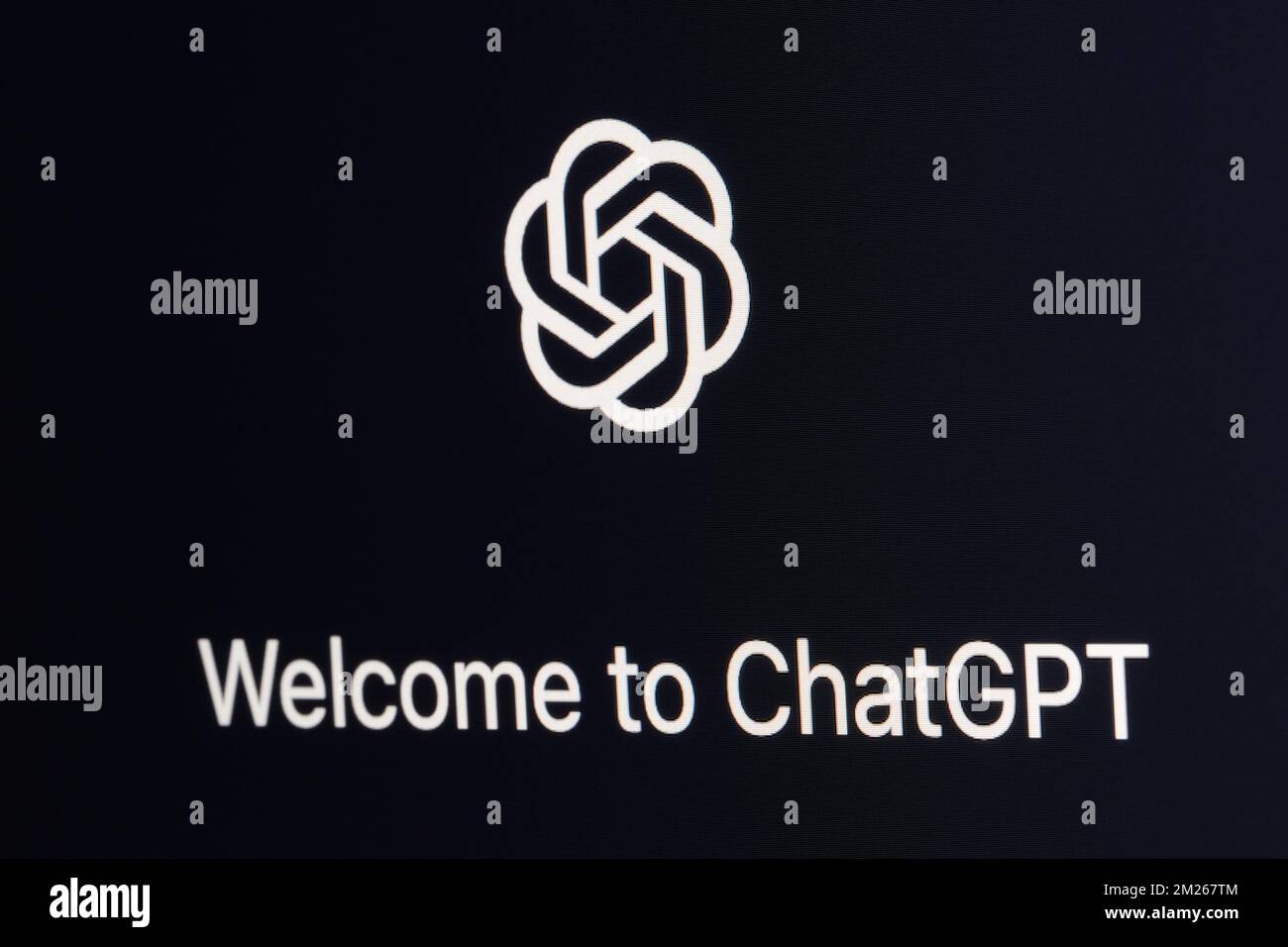 ChatGPT login screen seen on laptop display with visible pixels and ...