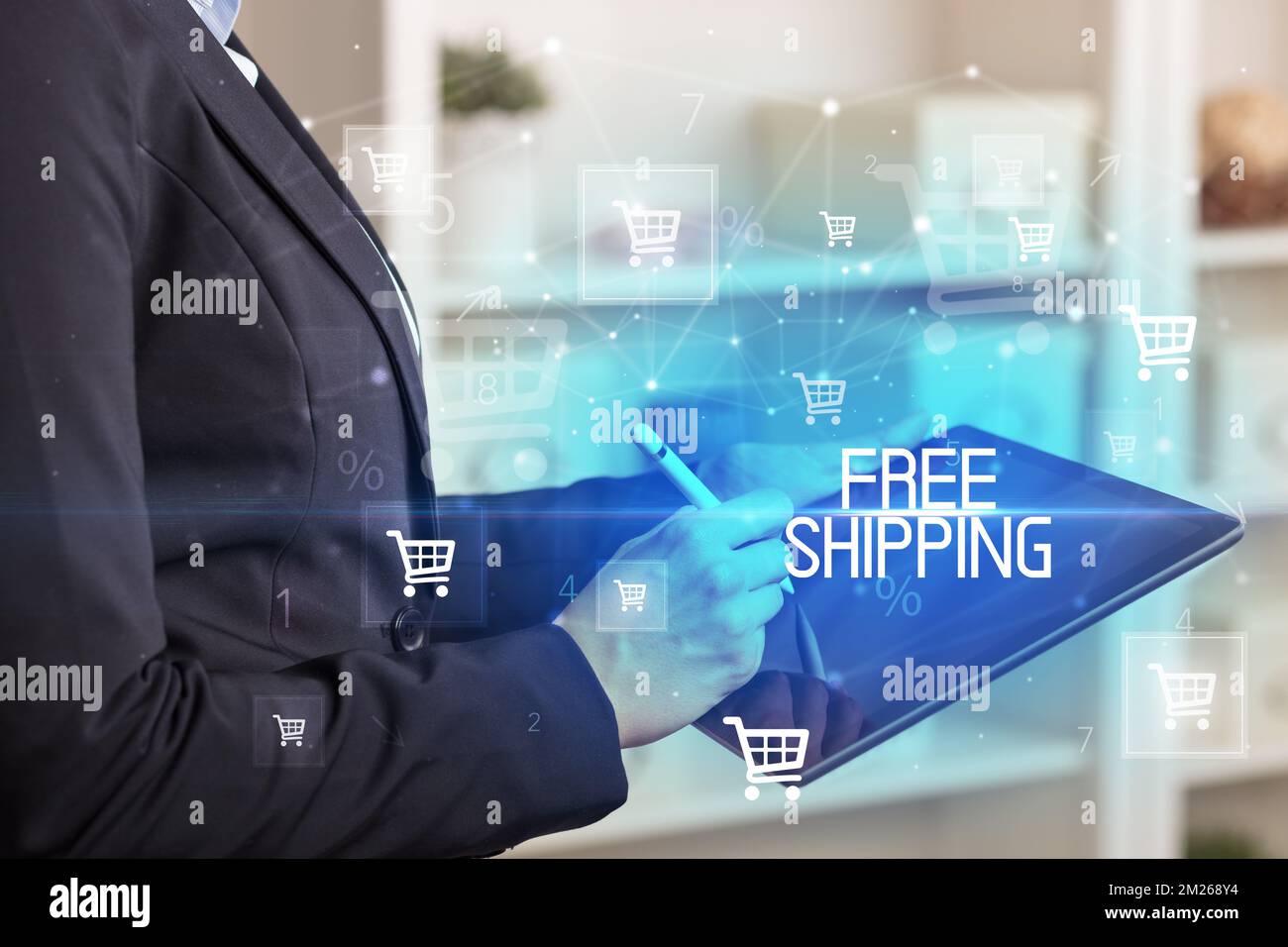 Young person makes a purchase through a tablet Stock Photo - Alamy