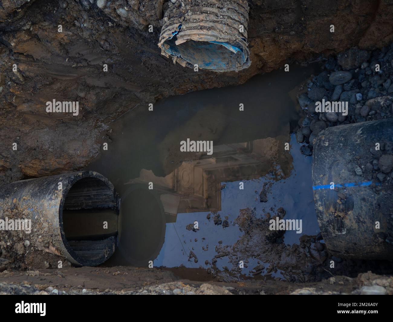 Works on the replacement of sewer pipes. Thick pipes underground ...