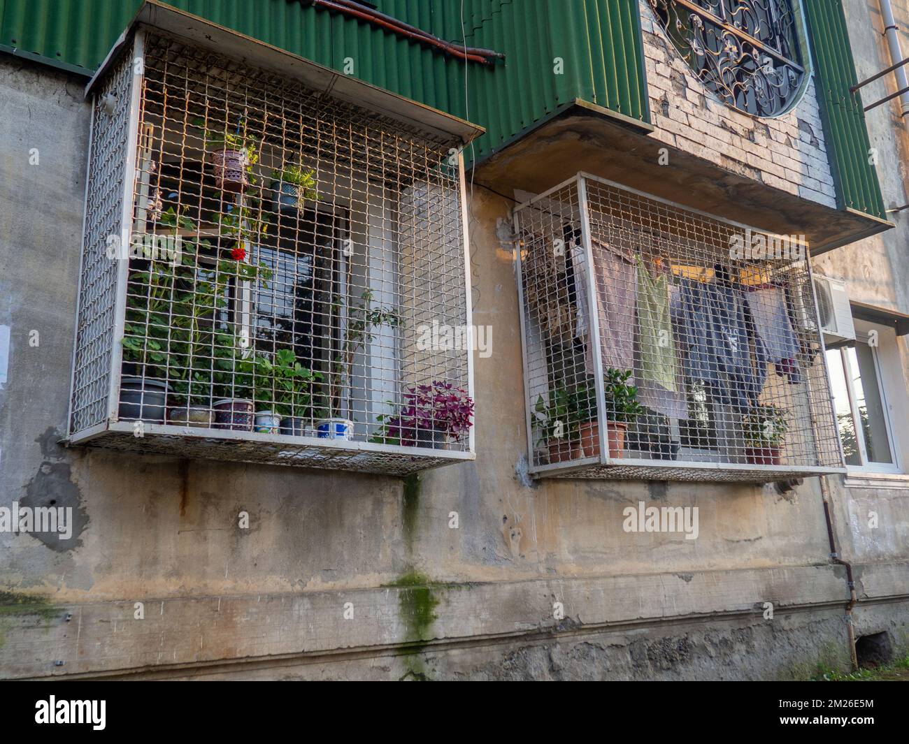 Unusual grilles for windows. Greenhouse on the window. window in a cage ...